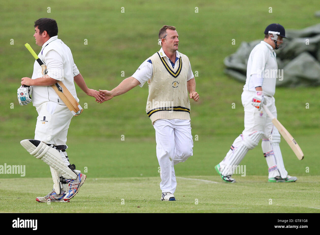 R Smith of Ardleigh Green is congratulated on his catch to dismiss L ...
