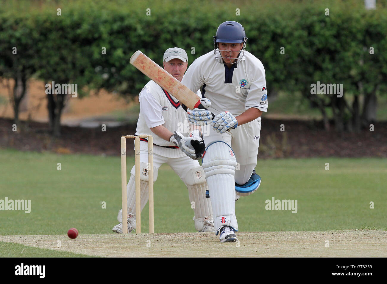 C Daniel of Bishops Challoner in batting action as A Little looks on ...