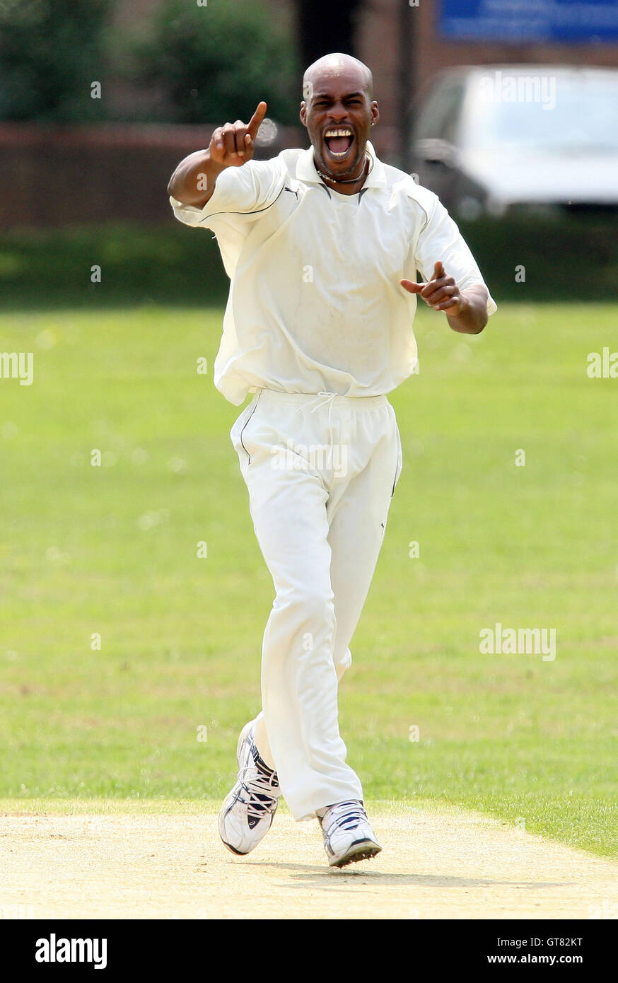Ex-England cricketer Chris Lewis celebrates his first wicket for Ilford ...