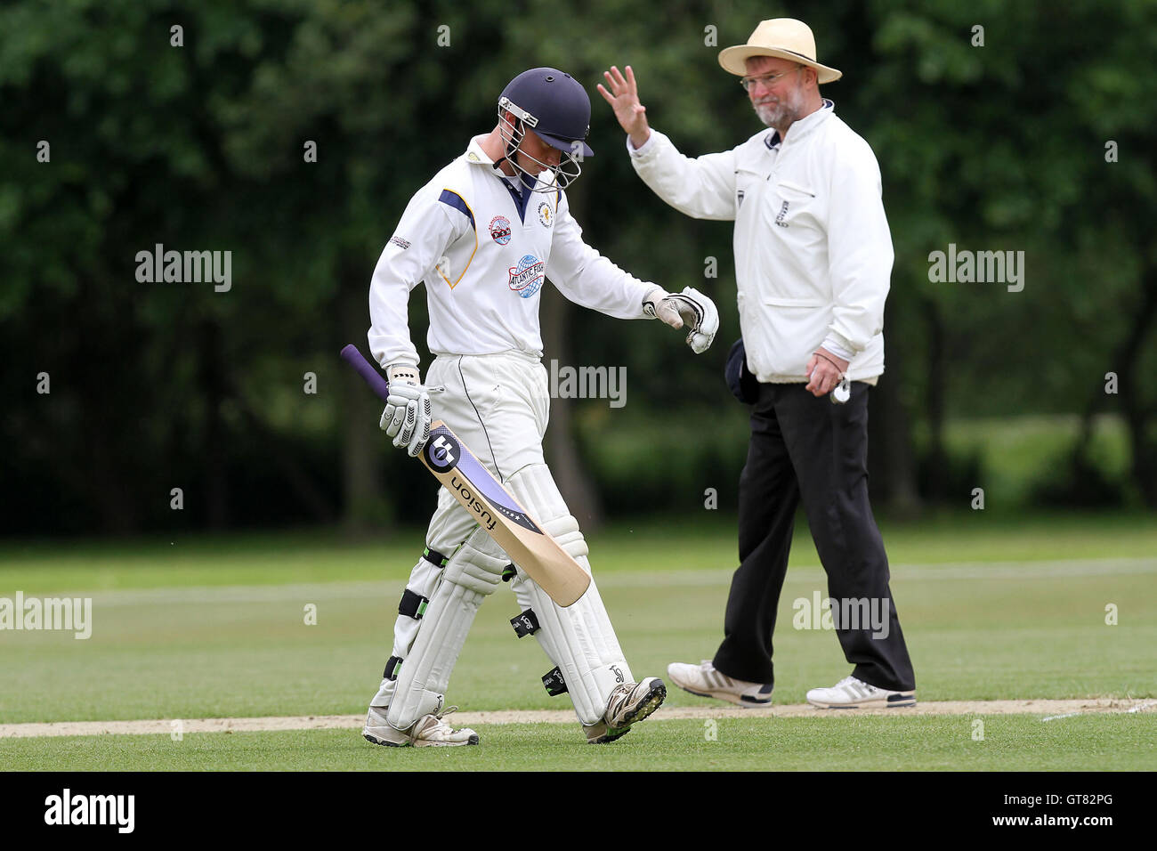 Ardleigh Green batsman Thomas Oakley leaves the field having been ...