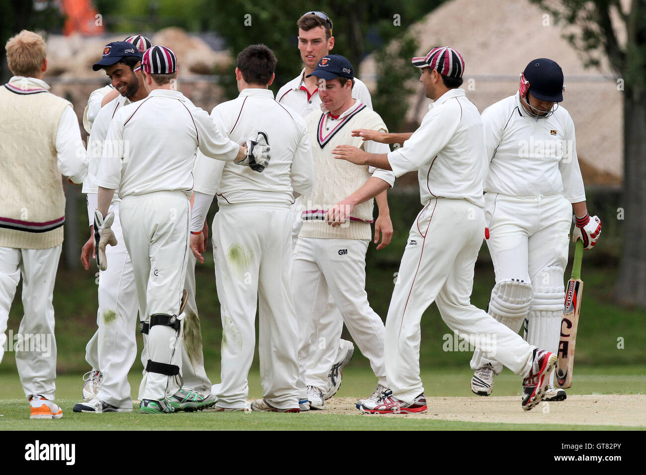 Alex Young of Colchester claims the wicket of S Mahboob and celebrates ...