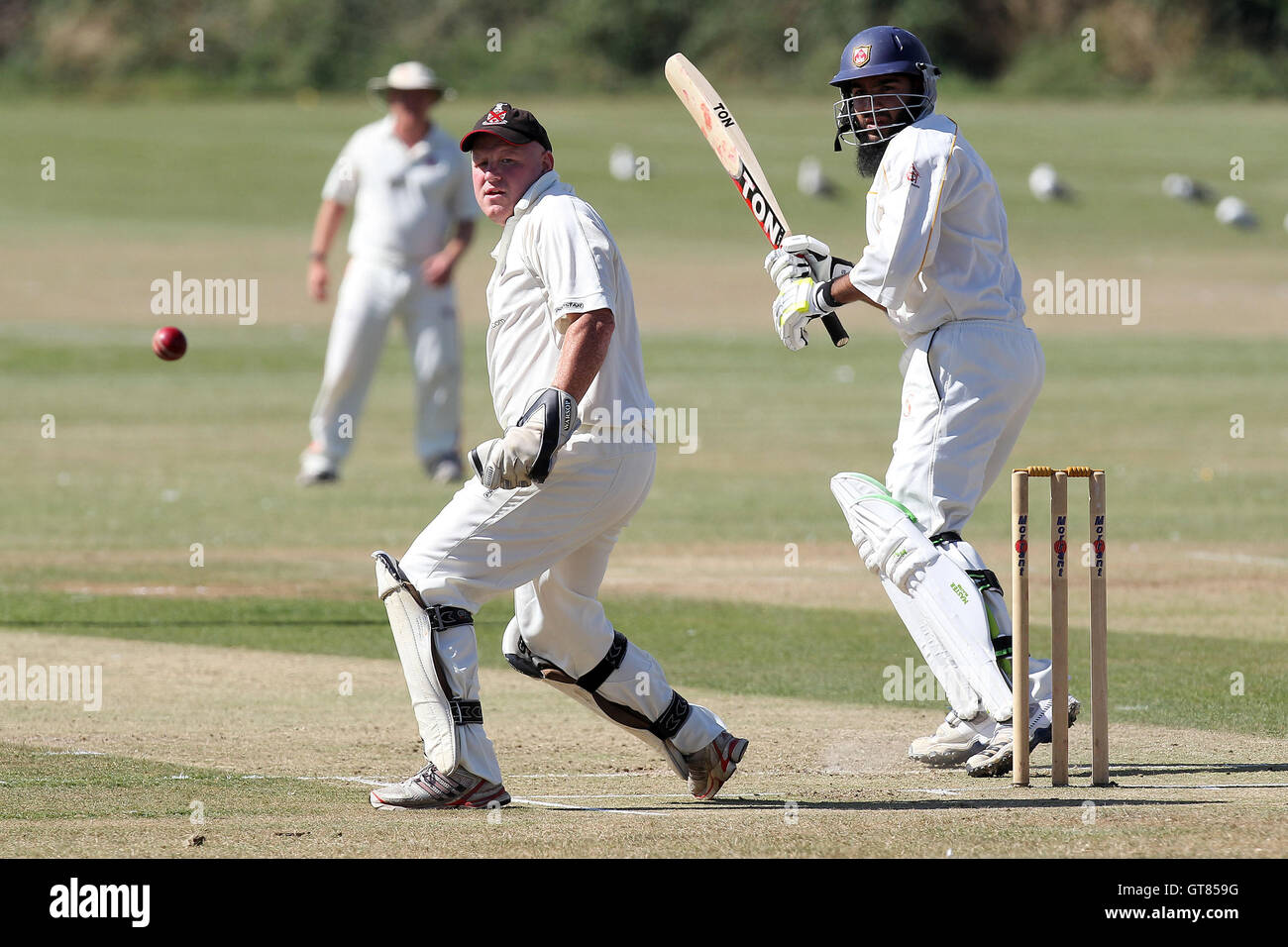 Irfan Shah of Hainualt finds the boundary for four runs as Paul Murray ...