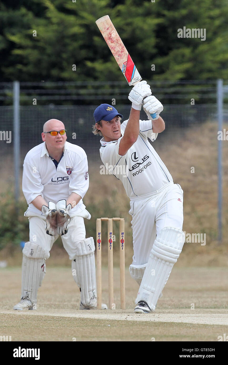 A Baars in batting action for Woodford Wells as J French looks on from ...