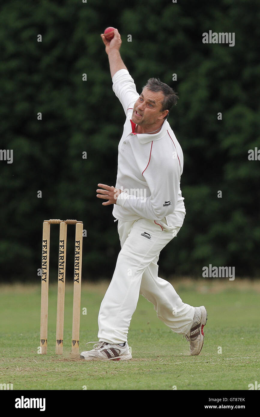 K Simms in bowling action for Rainham - Havering-atte-Bower CC 3rd XI ...