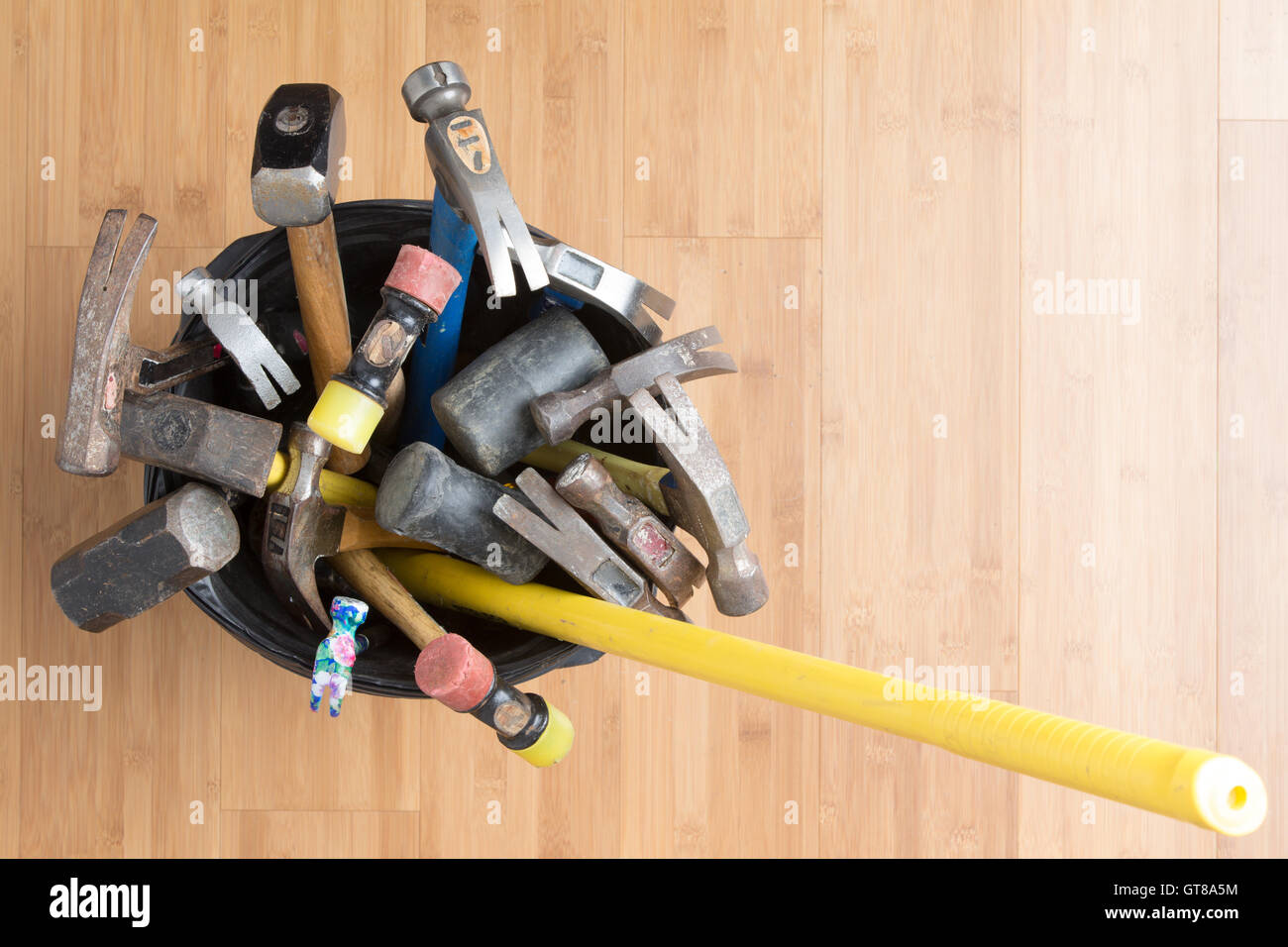 Overhead view of a large selection of different types of hammers for ...
