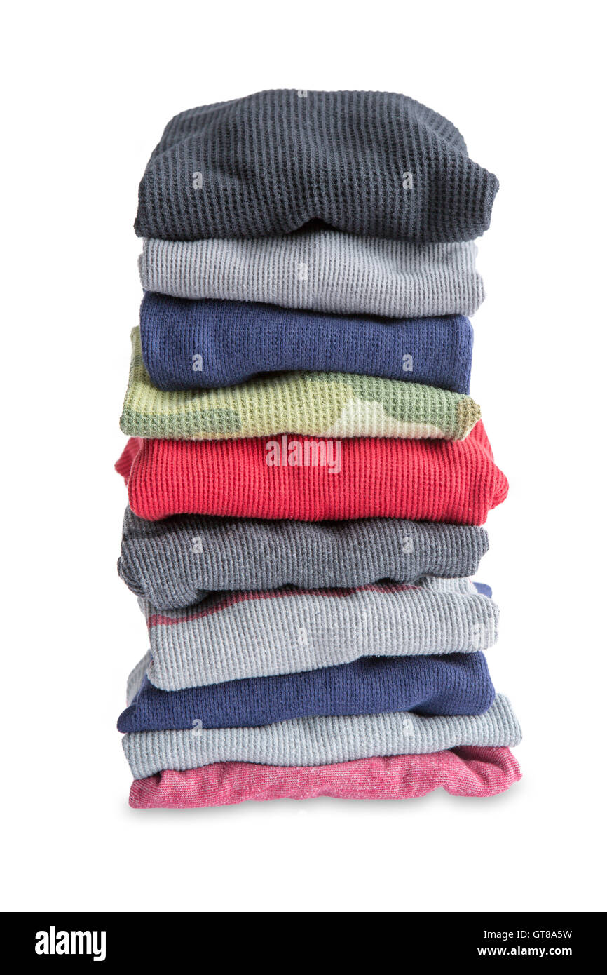 Close up Assorted Folded Newly Washed Clean Clothes in a Pile Isolated ...