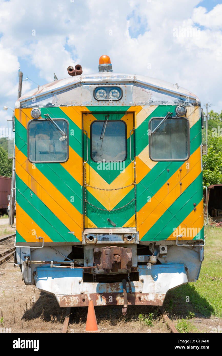 Front view of an old train or railroad rolling stock parked in a siding ...