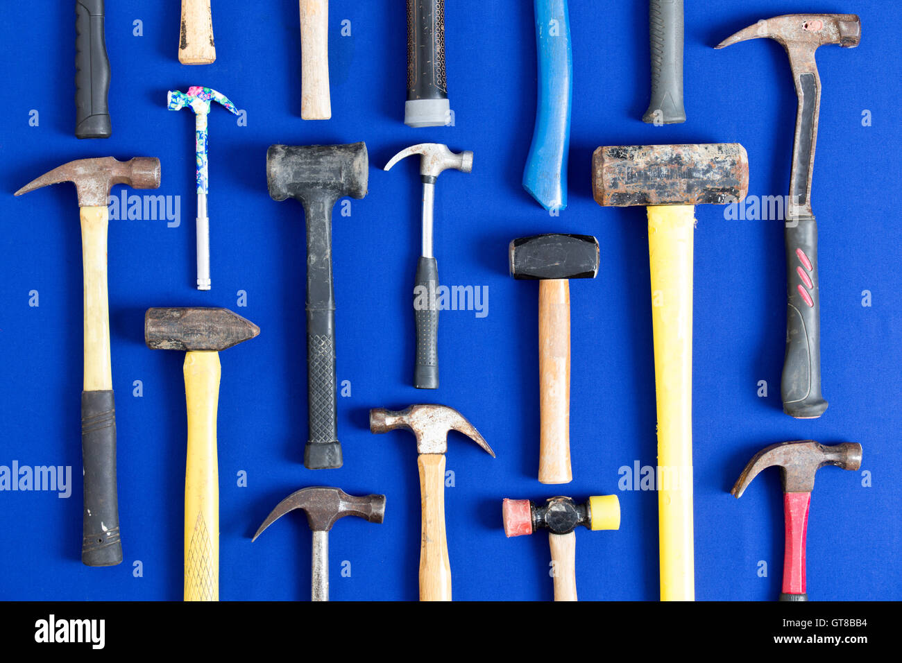 World of hammers with a large assortment of different shapes arranged ...