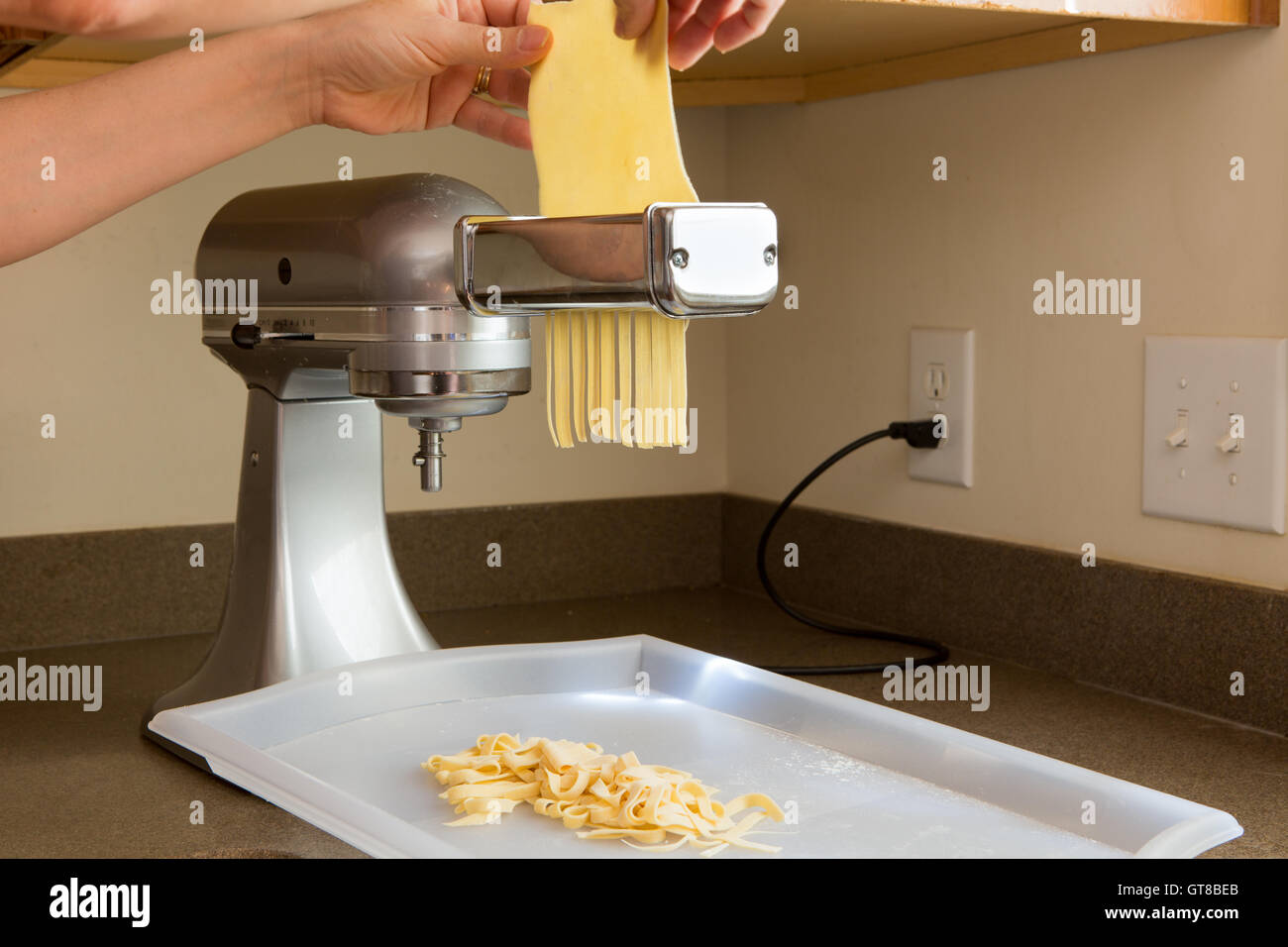 Chef feeding homemade pasta dough hi-res stock photography and images ...