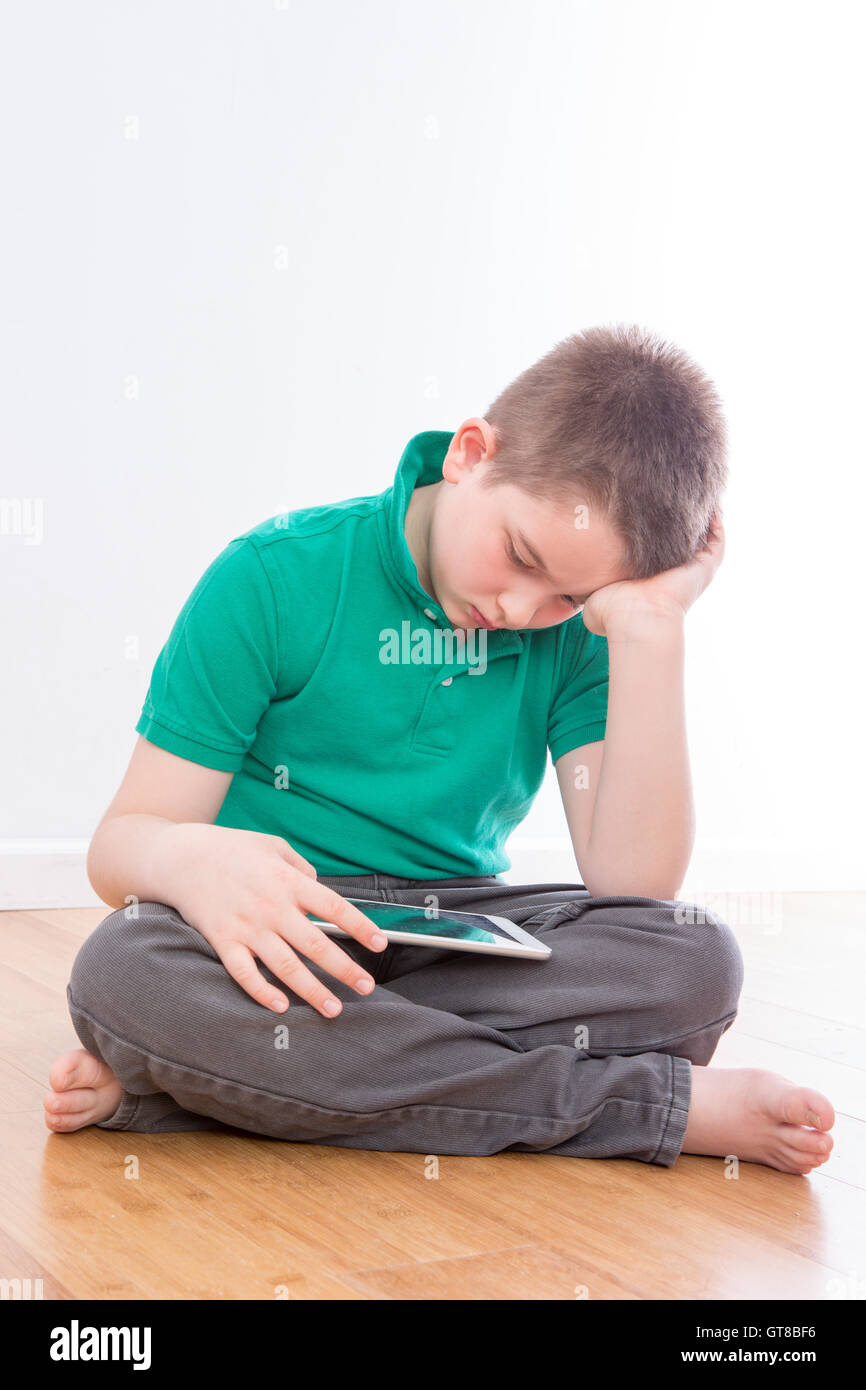 Child legs crossed hi-res stock photography and images - Alamy