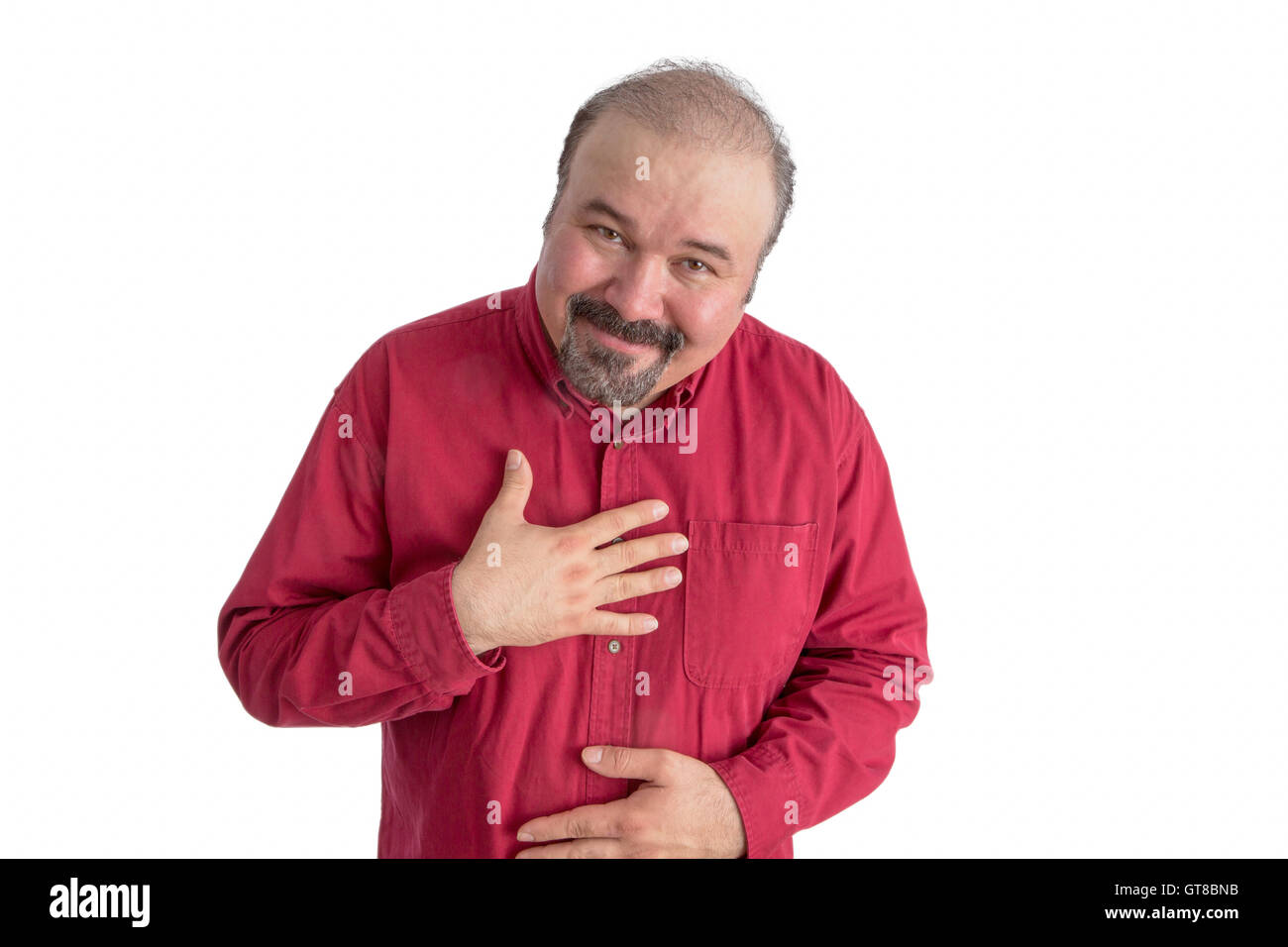 Ingratiating middle-aged balding man with a goatee showing his ...