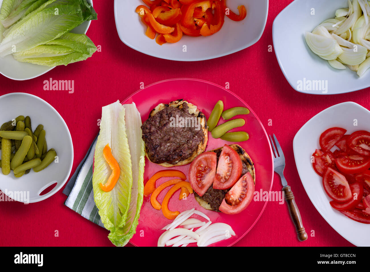 Creating the perfect healthy hamburger with two grilled beef patties on ...
