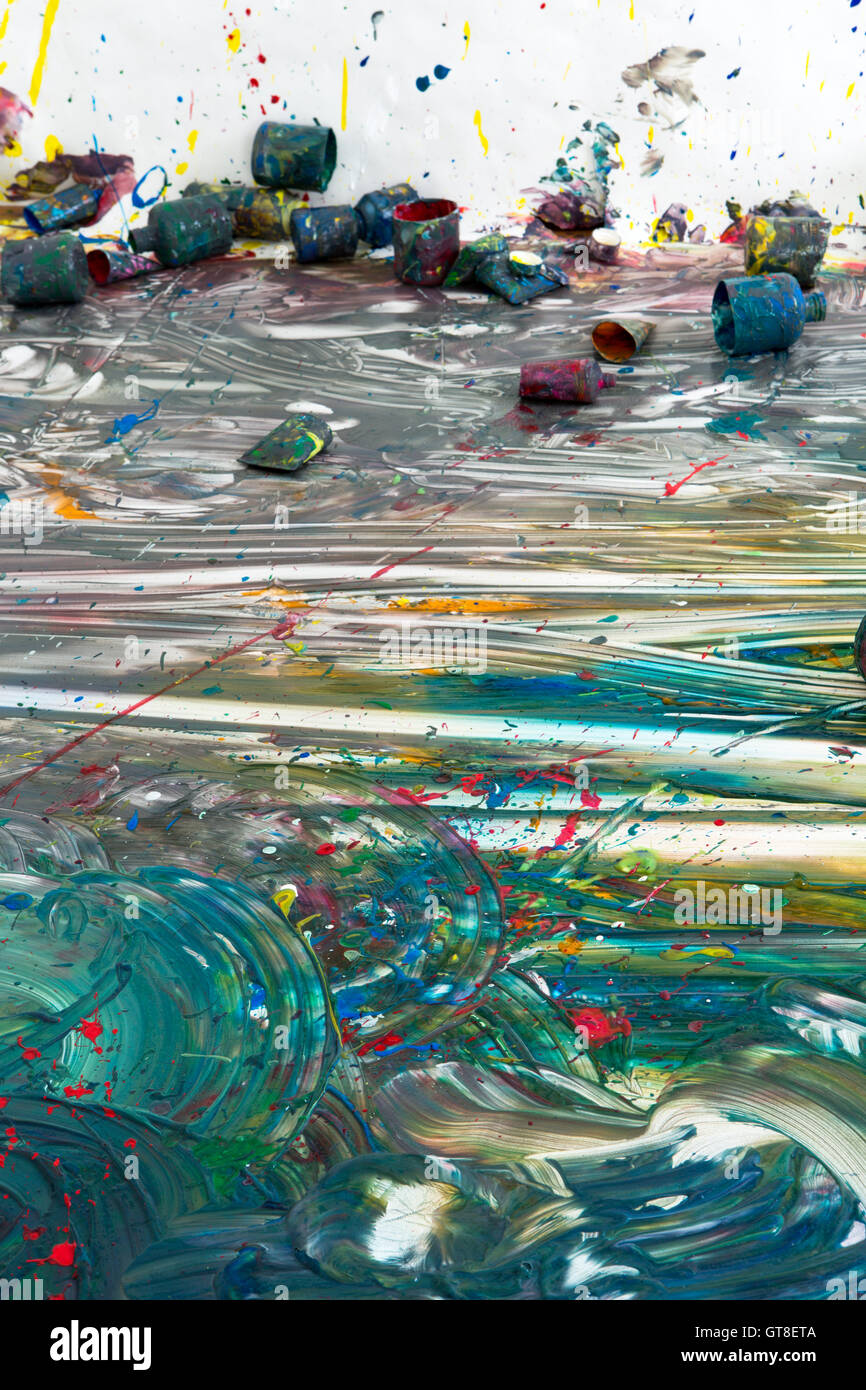 Colorful contemporary artwork on the floor with multiple discarded ...