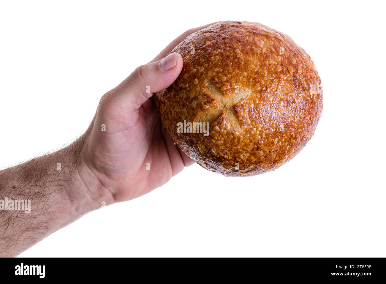 Clean muscular male hand giving or passing over a freshly baked crusty ...