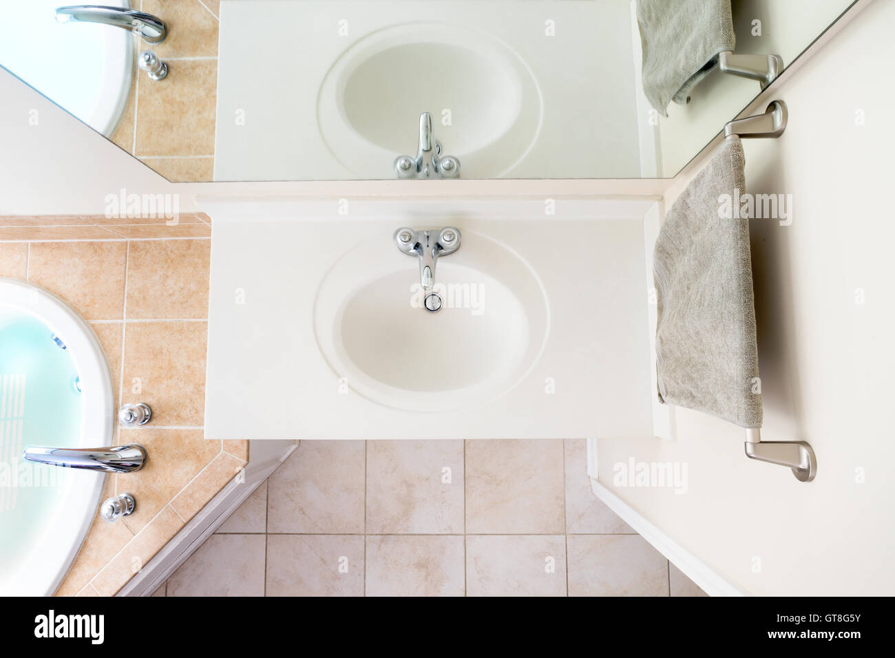 Overhead View of Classical Acrylic Top Sink along with a full bathtub ...