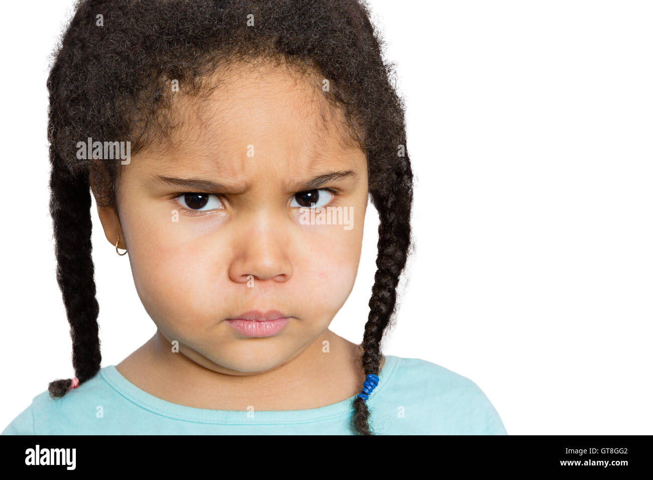 Close up Young Girl Staring at You with Angry Facial Expression Against ...