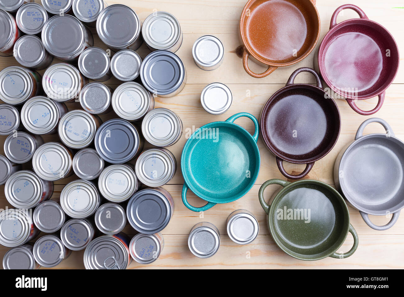 Pattern of canned food containers tops and multicolored empty bowls ...