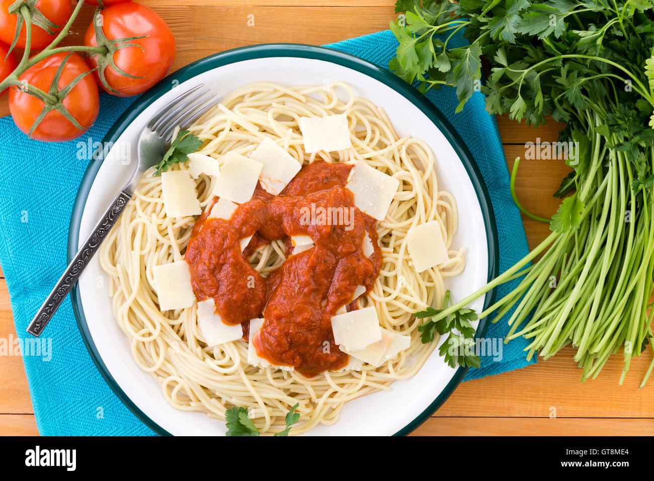 Delicious plate of spaghetti pasta garnished with grana padano cheese ...