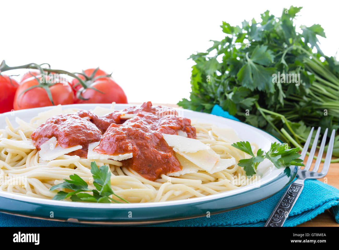 Prepared plate of spaghetti pasta garnished with grana padano cheese ...