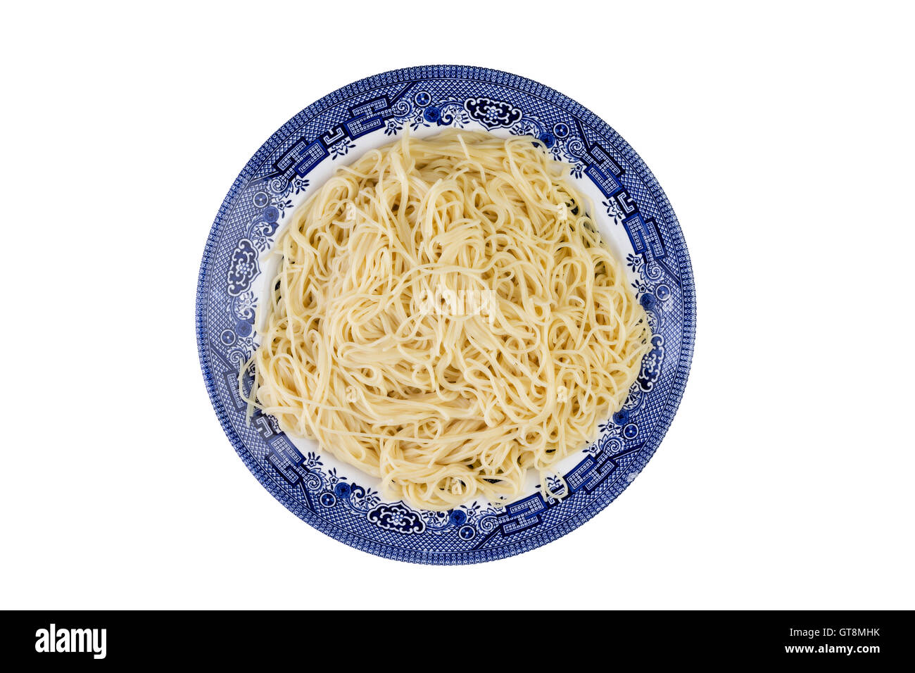 Plate of plain cooked Italian spaghetti pasta served on a blue plate ...