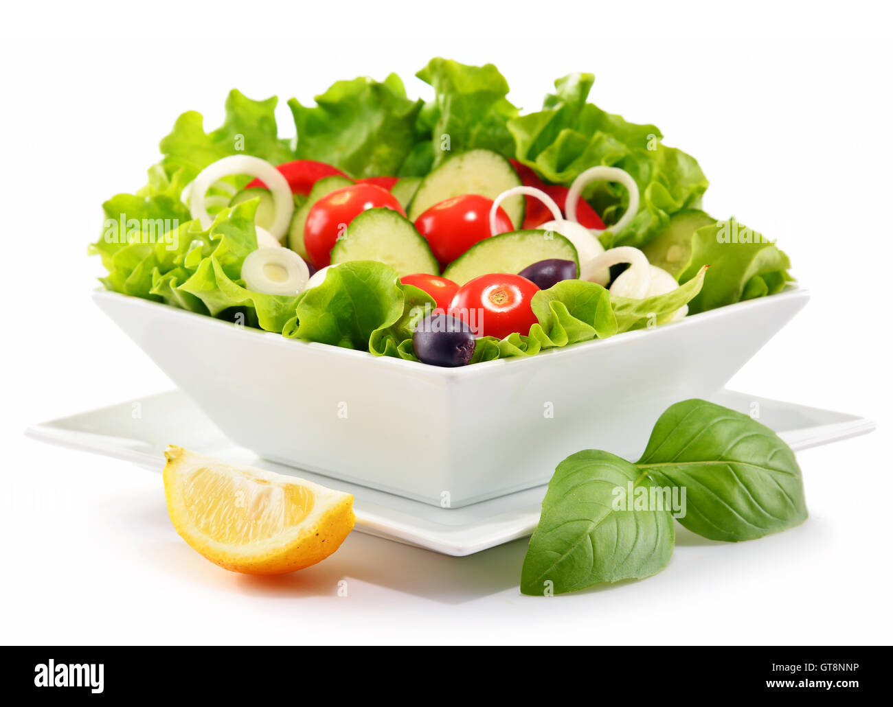 Vegetable salad bowl isolated on white background Stock Photo - Alamy