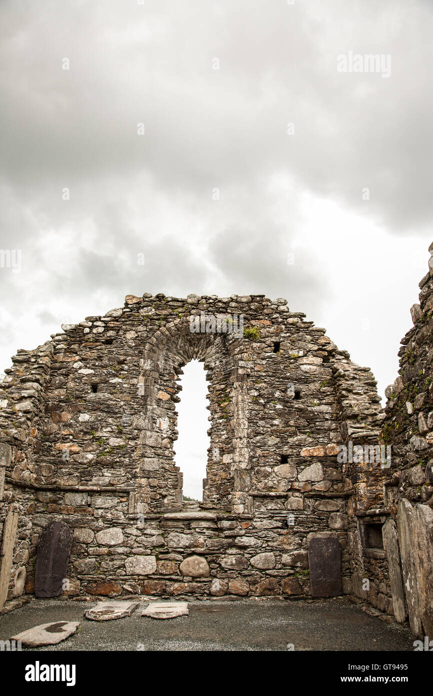 Historic site Glendalough Monastic cathedral stone ruins and window in ...