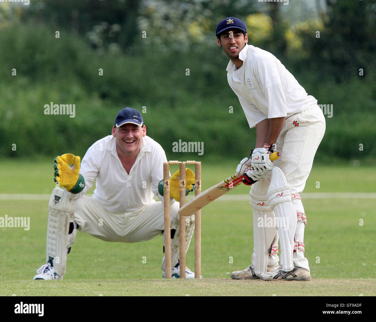 Wicket keeper batsman and bowler hi-res stock photography and images ...