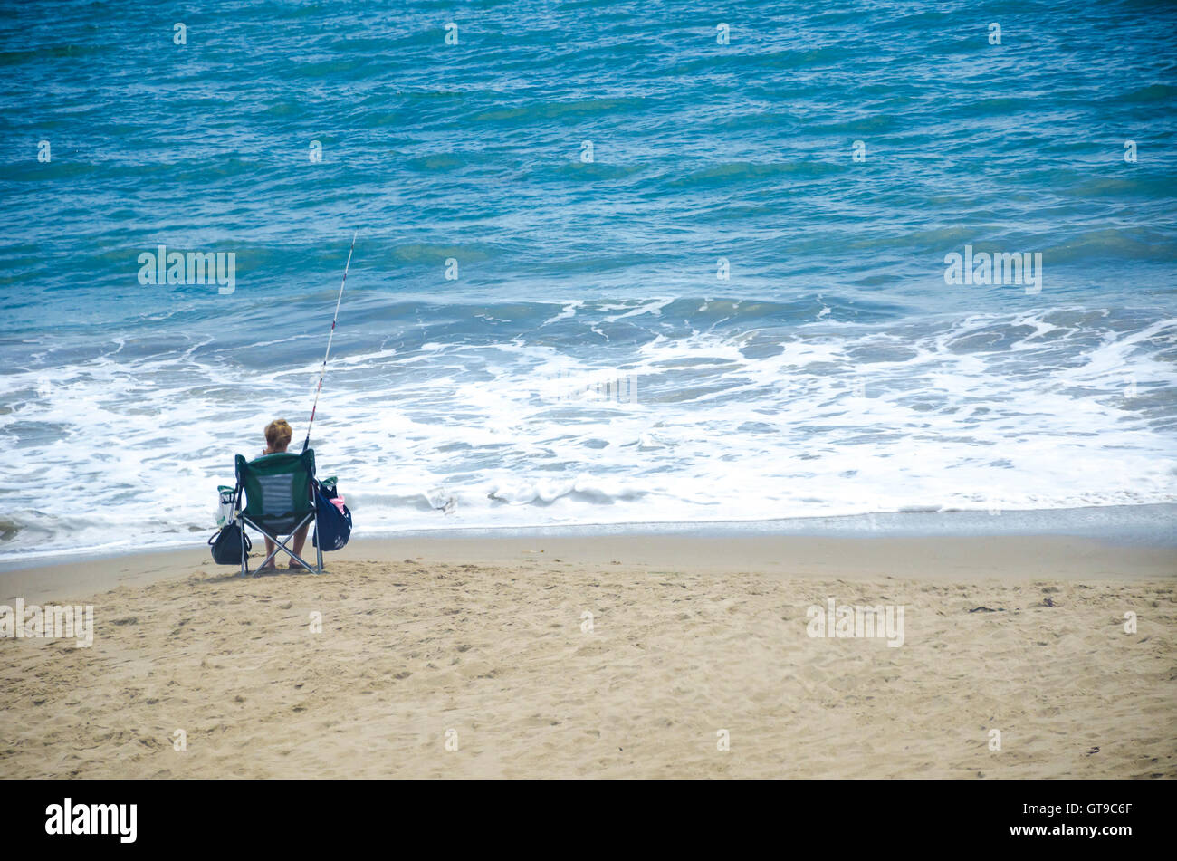 Woman fishing sea hi-res stock photography and images - Alamy