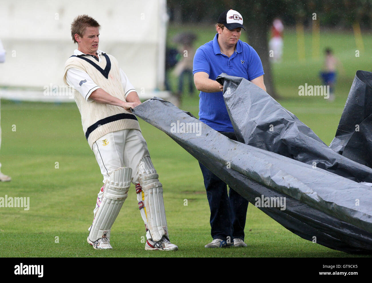 A not unusual scene as the covers come on at Upminster CC as rain ...