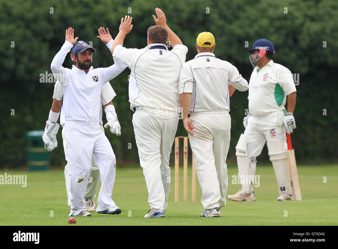 Upminster players celebrate the wicket of M Malik - Upminster CC vs ...
