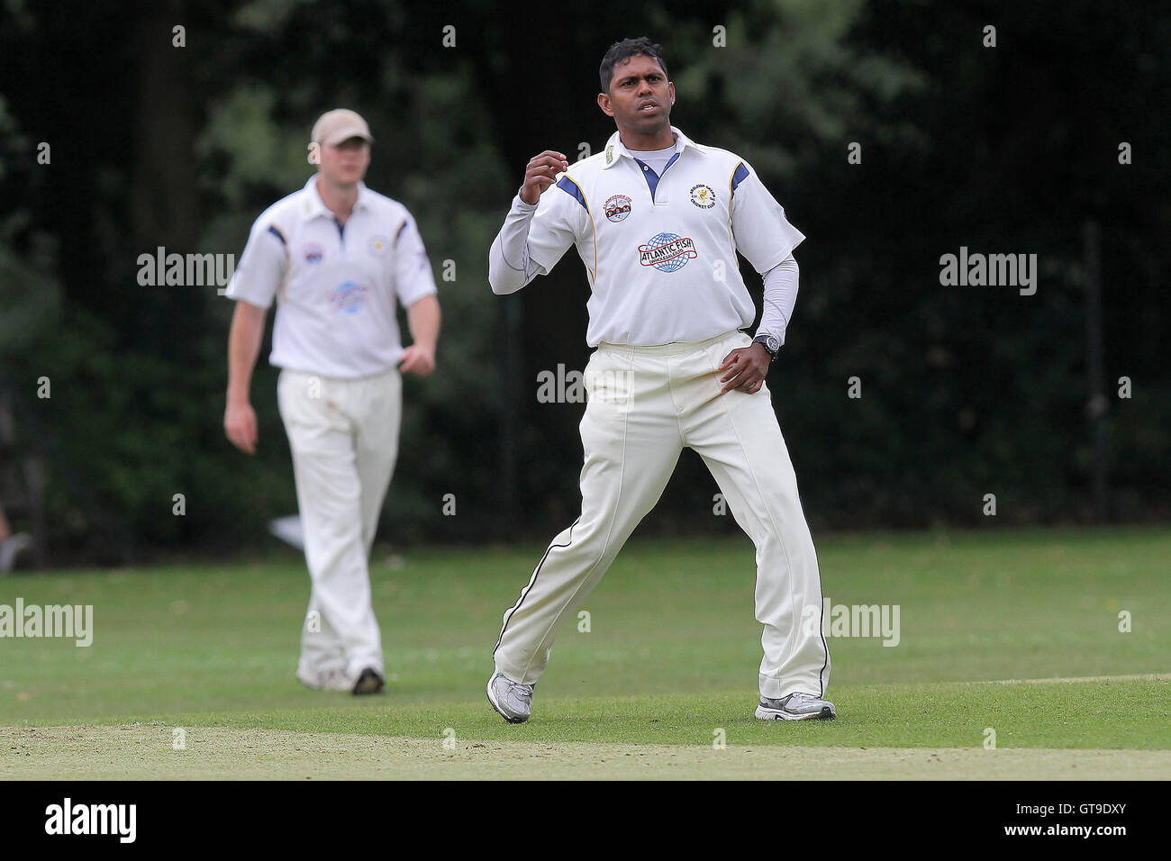 A Krishnan in bowling action for Ardleigh Green - Wanstead CC (batting ...