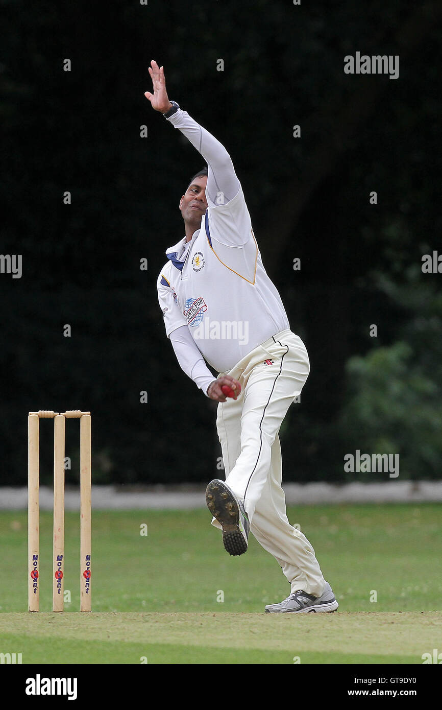 A Krishnan in bowling action for Ardleigh Green - Wanstead CC (batting ...