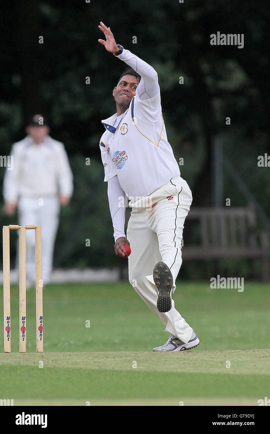 A Krishnan in bowling action for Ardleigh Green - Wanstead CC (batting ...