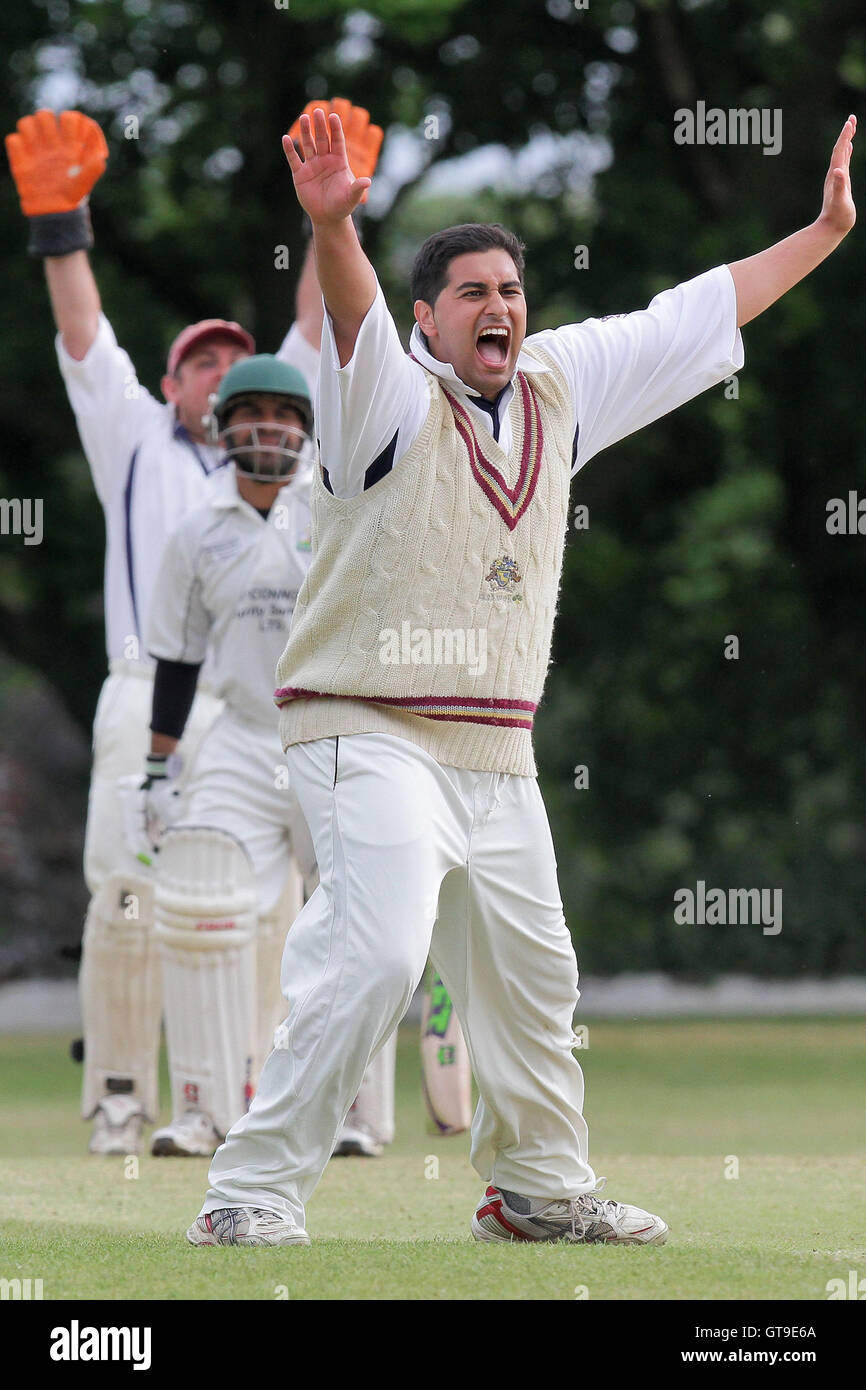 Mouhssin Ismail of Hainault & Clayhall claims the wicket of Arfan Akram ...