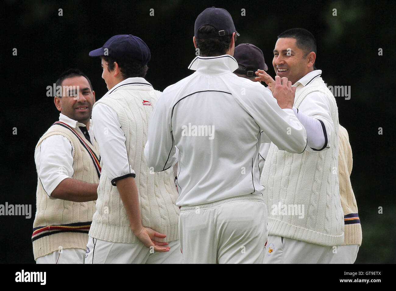 Shahid Saeed of Wanstead (R) celebrates the wicket of James Lever with ...