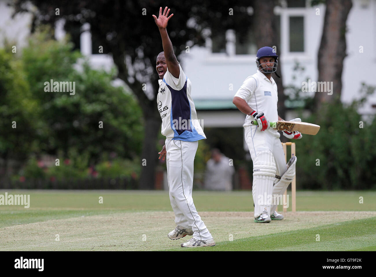 Donovan Miller of Woodford Wells claims the wicket of M Ibrahim ...