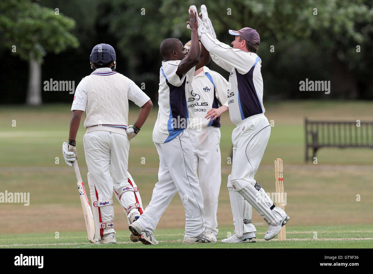 Donovan Miller of Woodford Wells celebrates the wicket of Neville ...