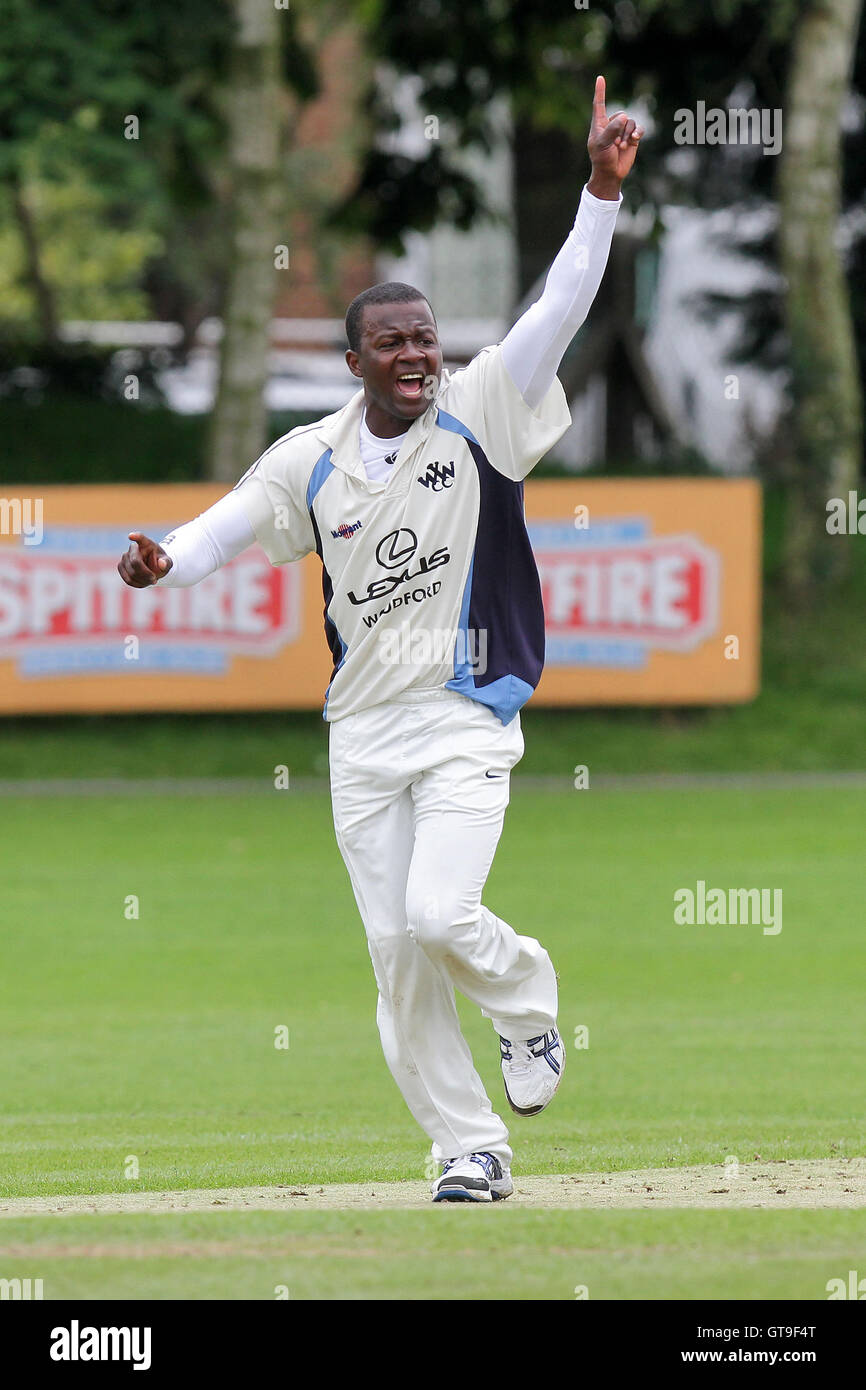 Donovan Miller of Woodford Wells celebrates the wicket of Bilal Butt ...