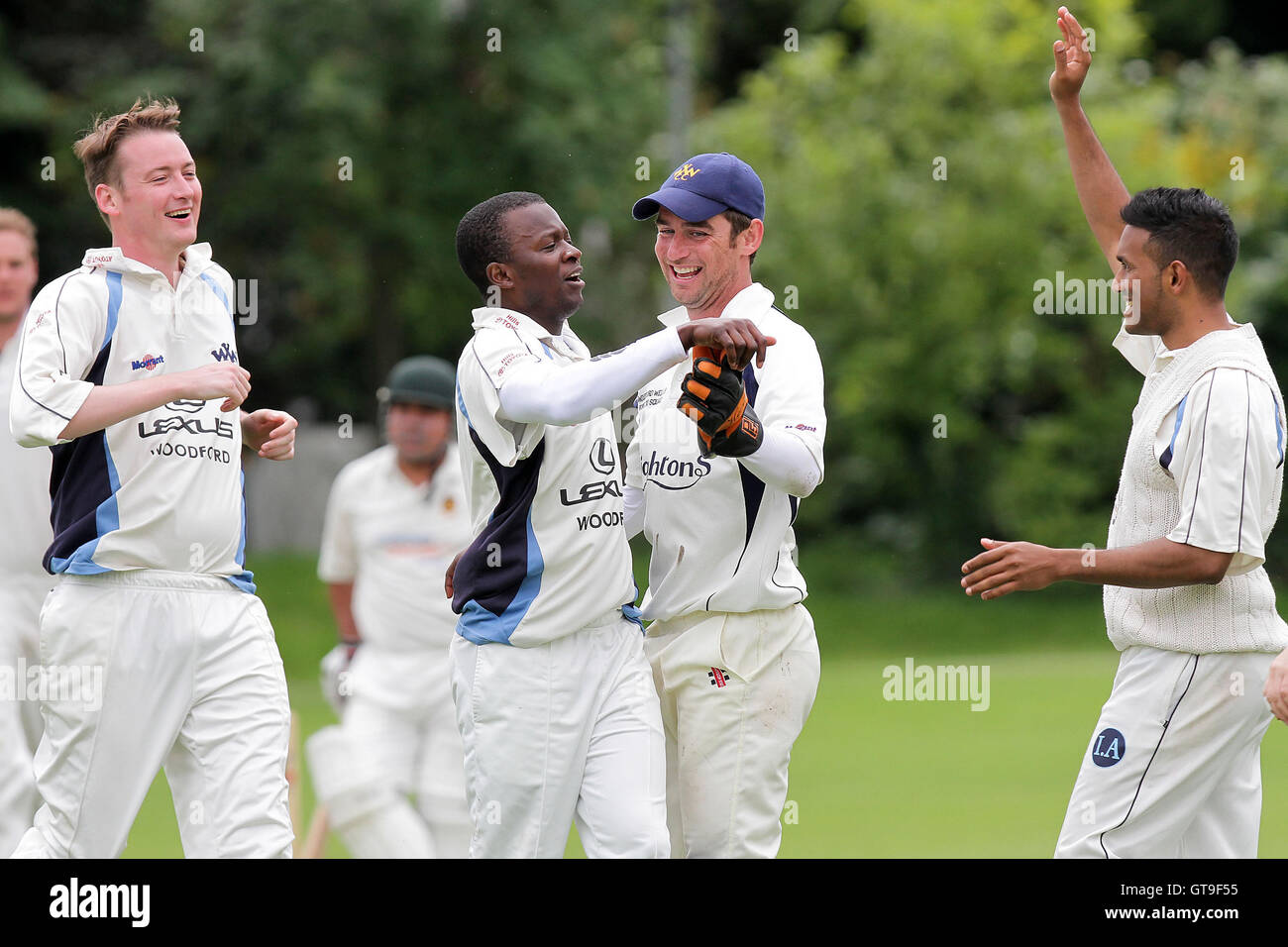 Donovan Miller of Woodford Wells celebrates the wicket of Bilal Butt ...