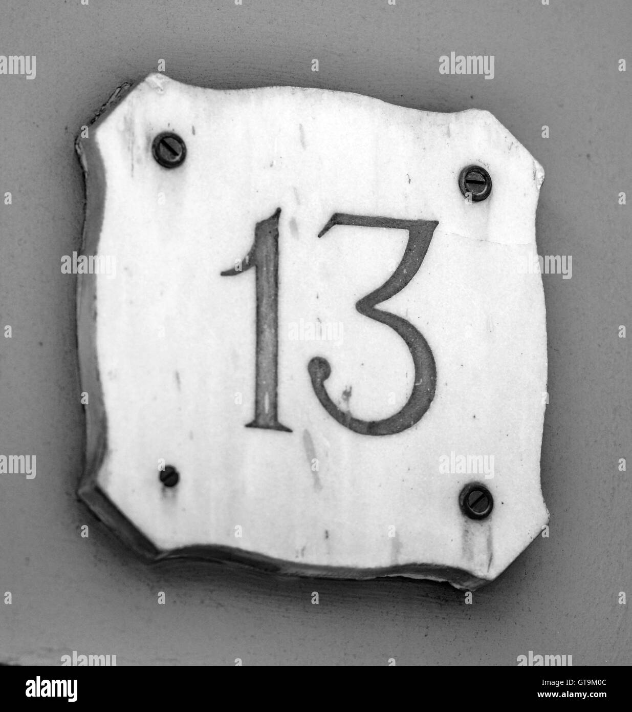 Number 13 on house wall Stock Photo - Alamy