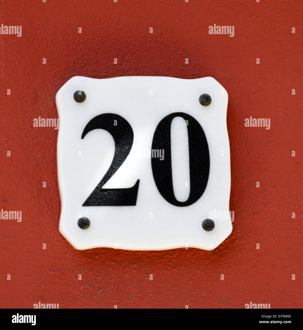 Number 20 on house wall Stock Photo - Alamy