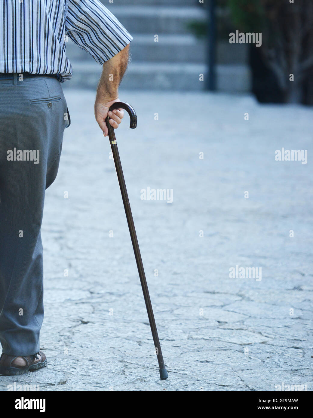 Old chinese man walking stick hi-res stock photography and images - Alamy