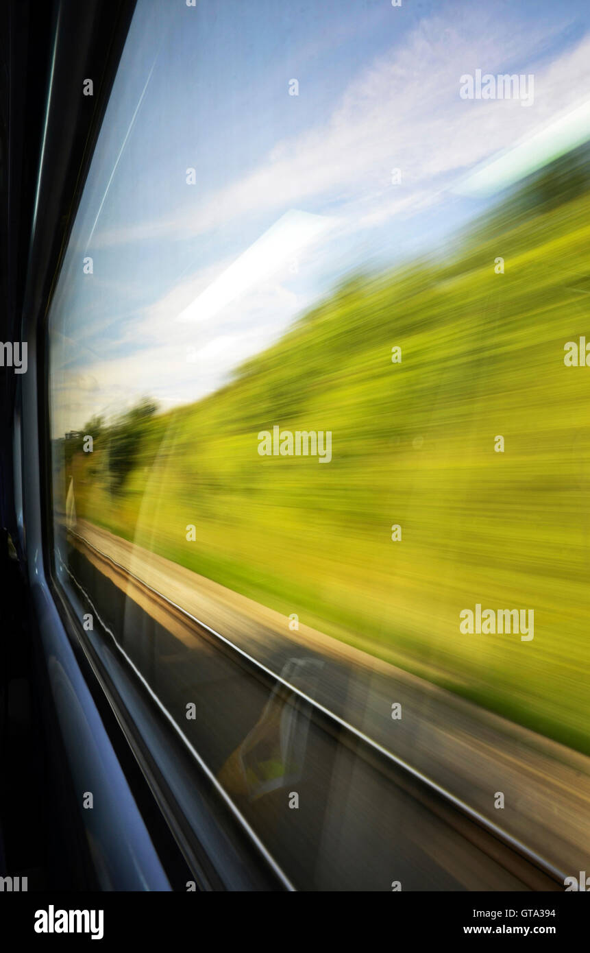 Looking out Speeding Train Window at Country Side Stock Photo - Alamy