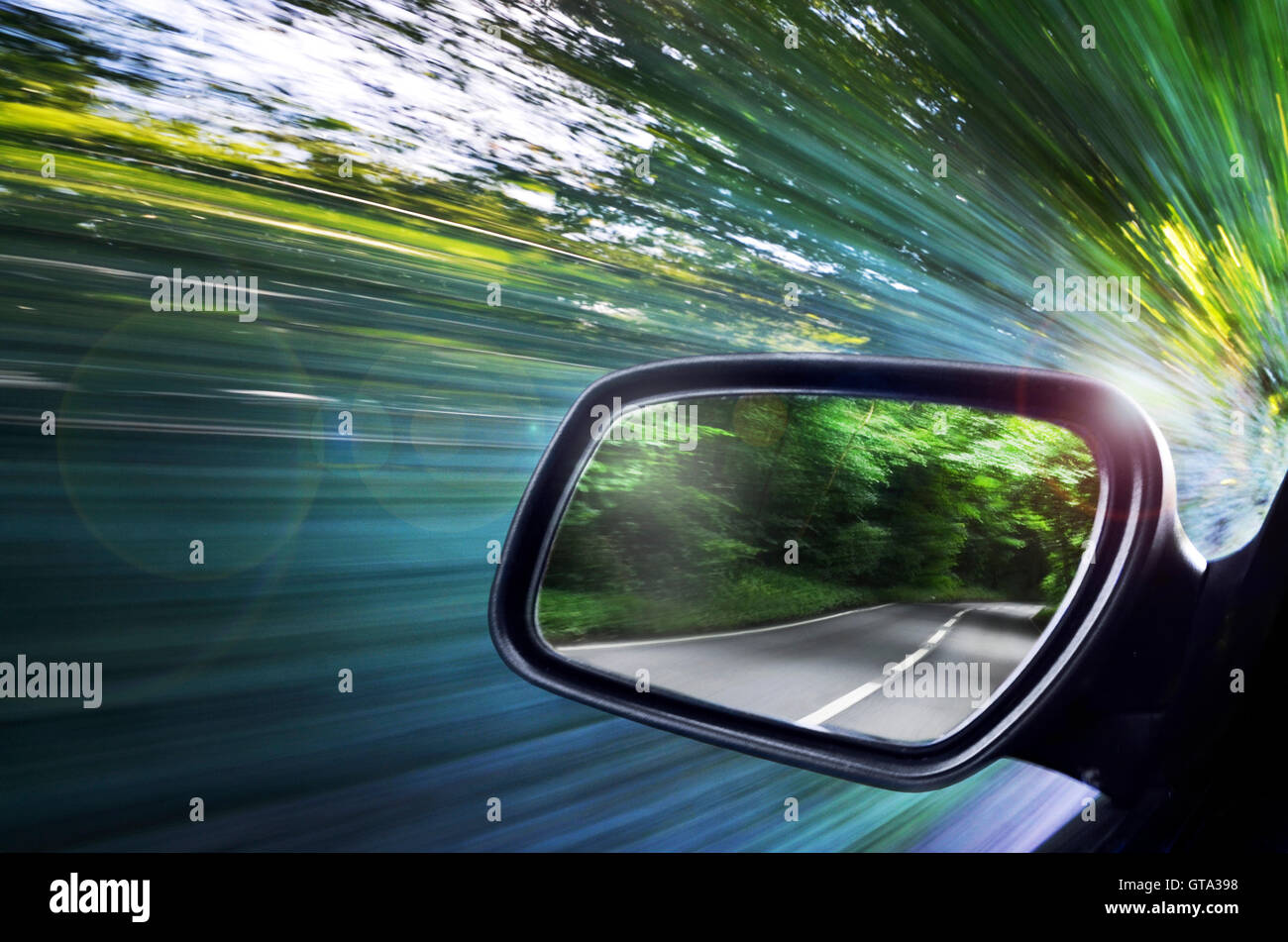 View of Road Reflected in Car's Driver's Side Mirror Stock Photo - Alamy