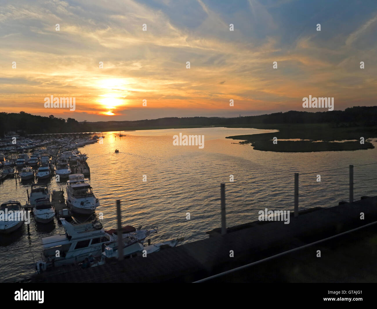 Boats lake sunset hi-res stock photography and images - Alamy