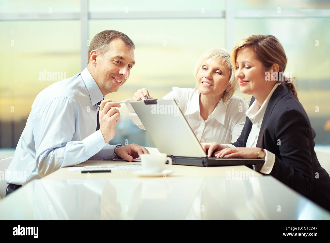 Mature business woman working on hi-res stock photography and images ...