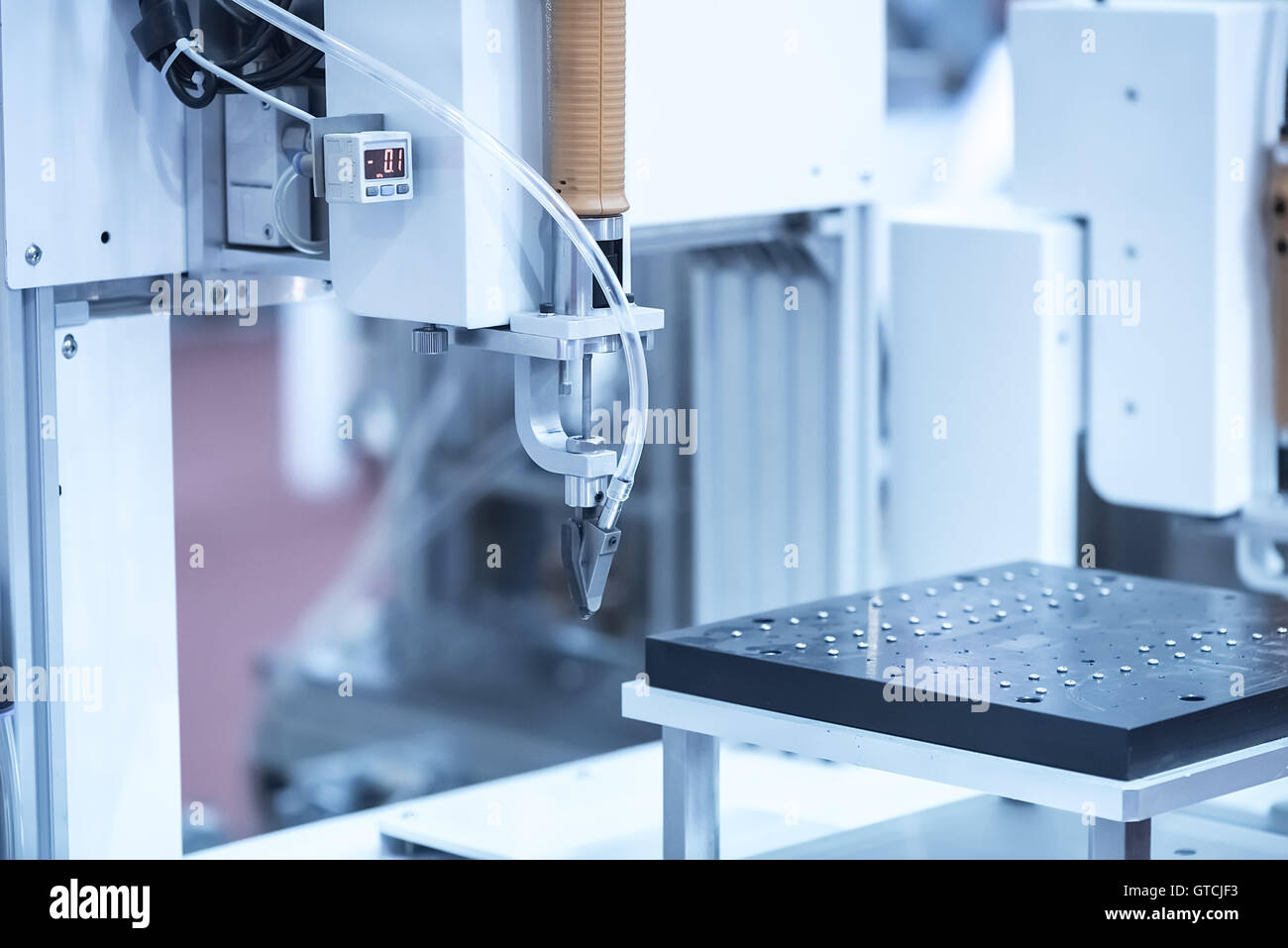 CNC machine at work Stock Photo - Alamy