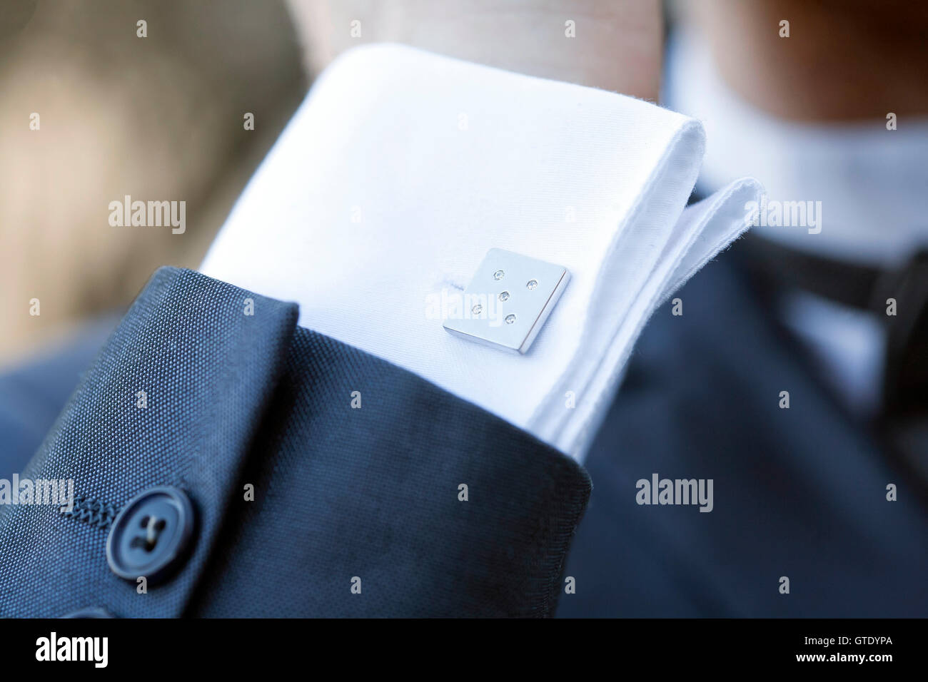 Elegant luxury cuff-links on man's sleeves Stock Photo - Alamy