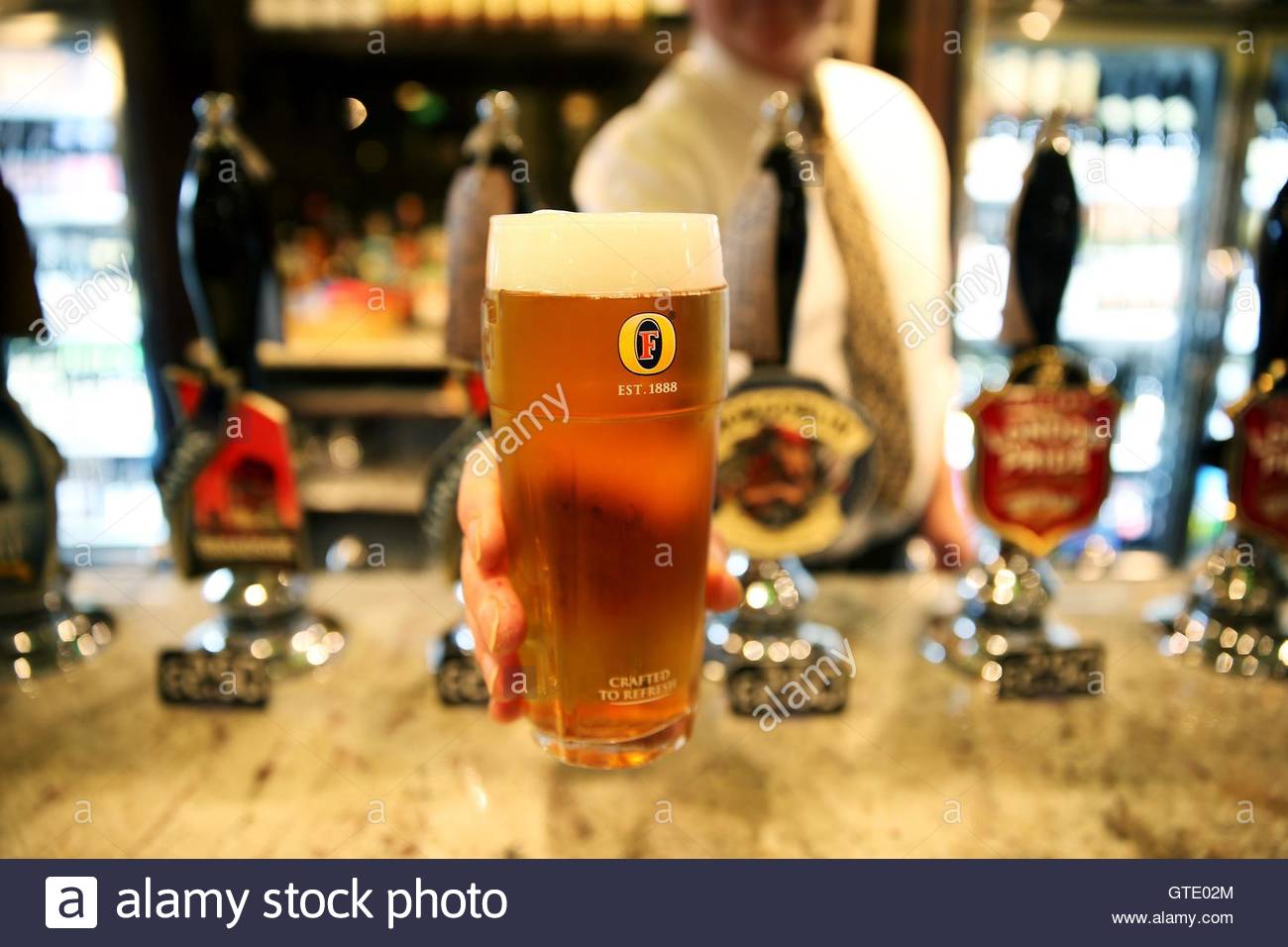 Pint Of Fosters Stock Photos & Pint Of Fosters Stock Images - Alamy