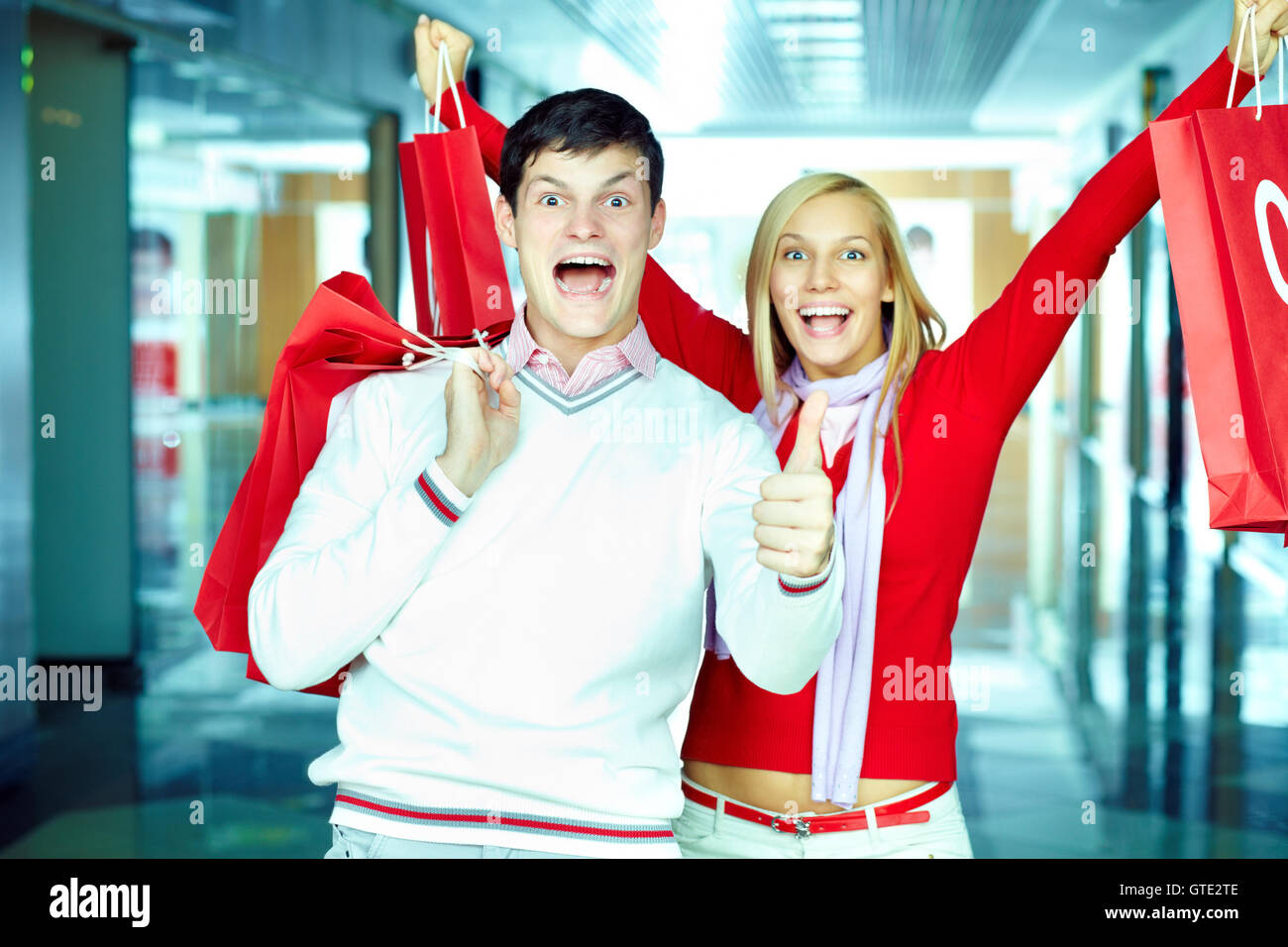 Excited young shoppers hi-res stock photography and images - Alamy